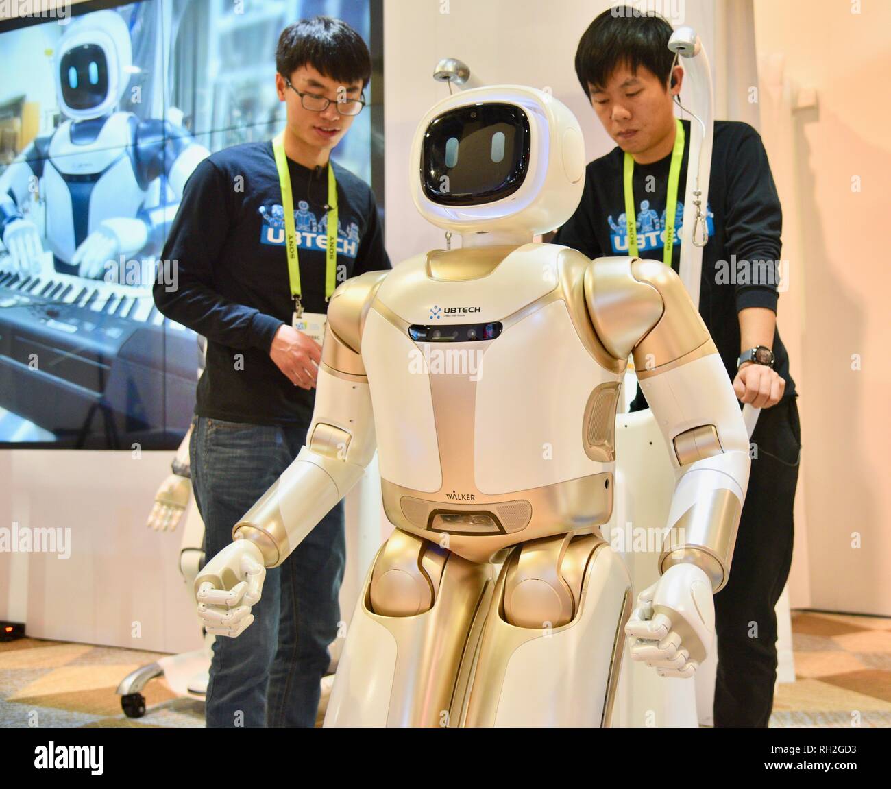 Ubtech's humanoid robot, Walker, demonstrates robotic skills at exhibit ...