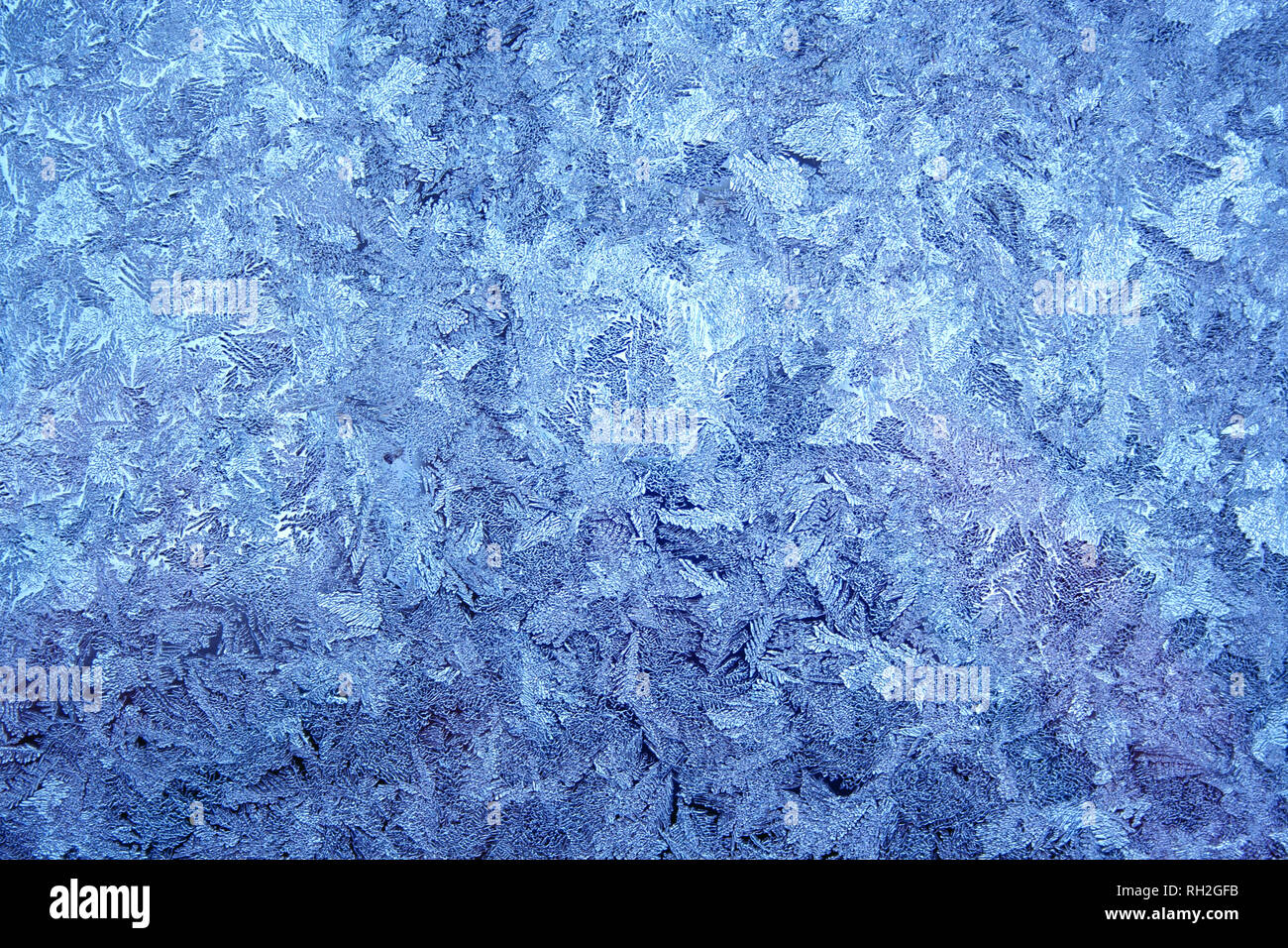 Ice crystals pattern on the window close up. Ice texture. Winter ...