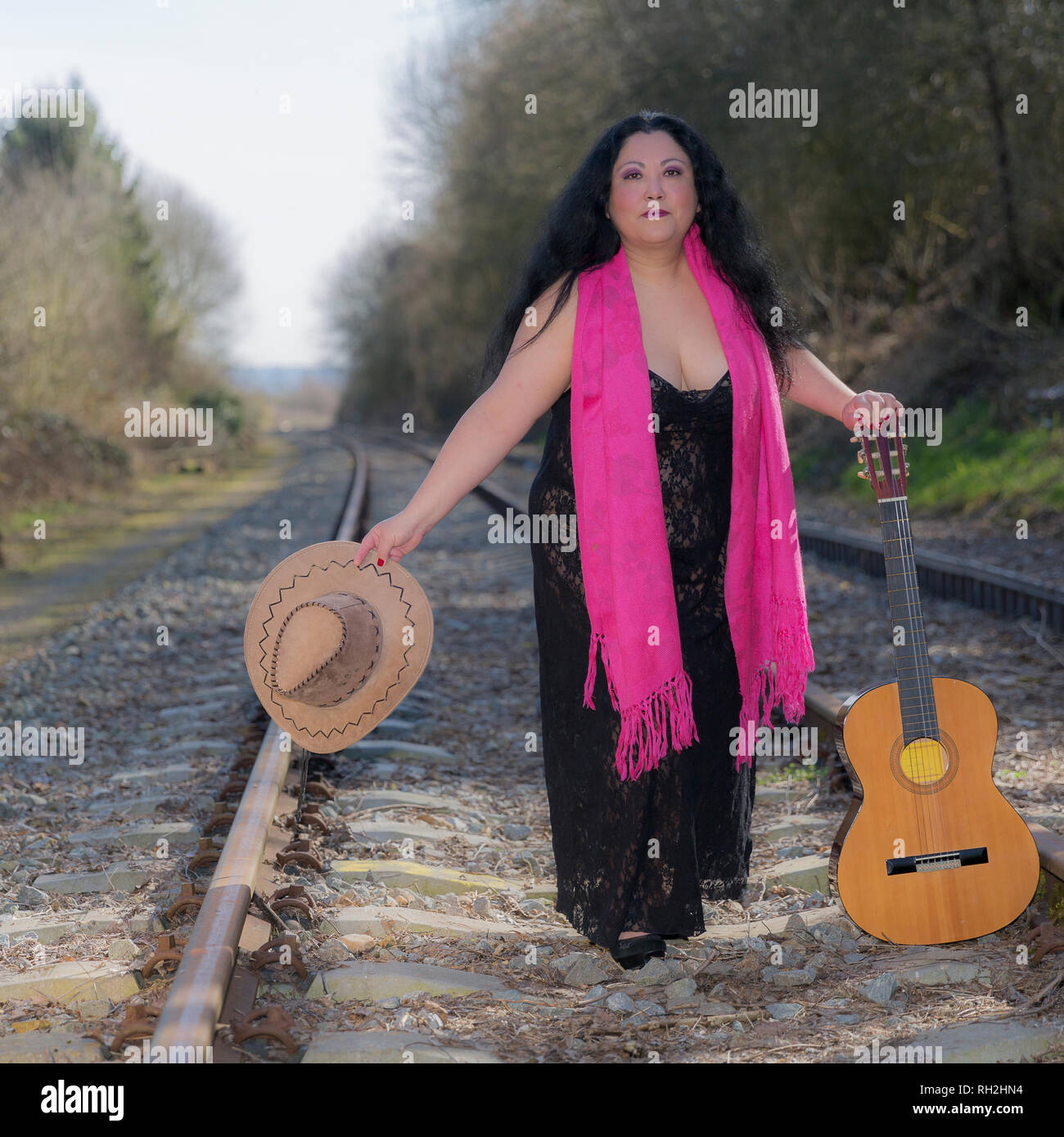 Lady on train tracks hi-res stock photography and images - Alamy