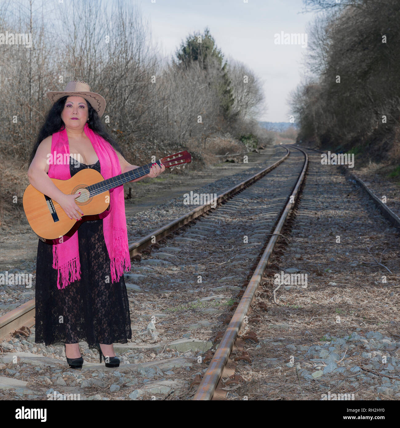 Lady on train tracks hi-res stock photography and images - Alamy