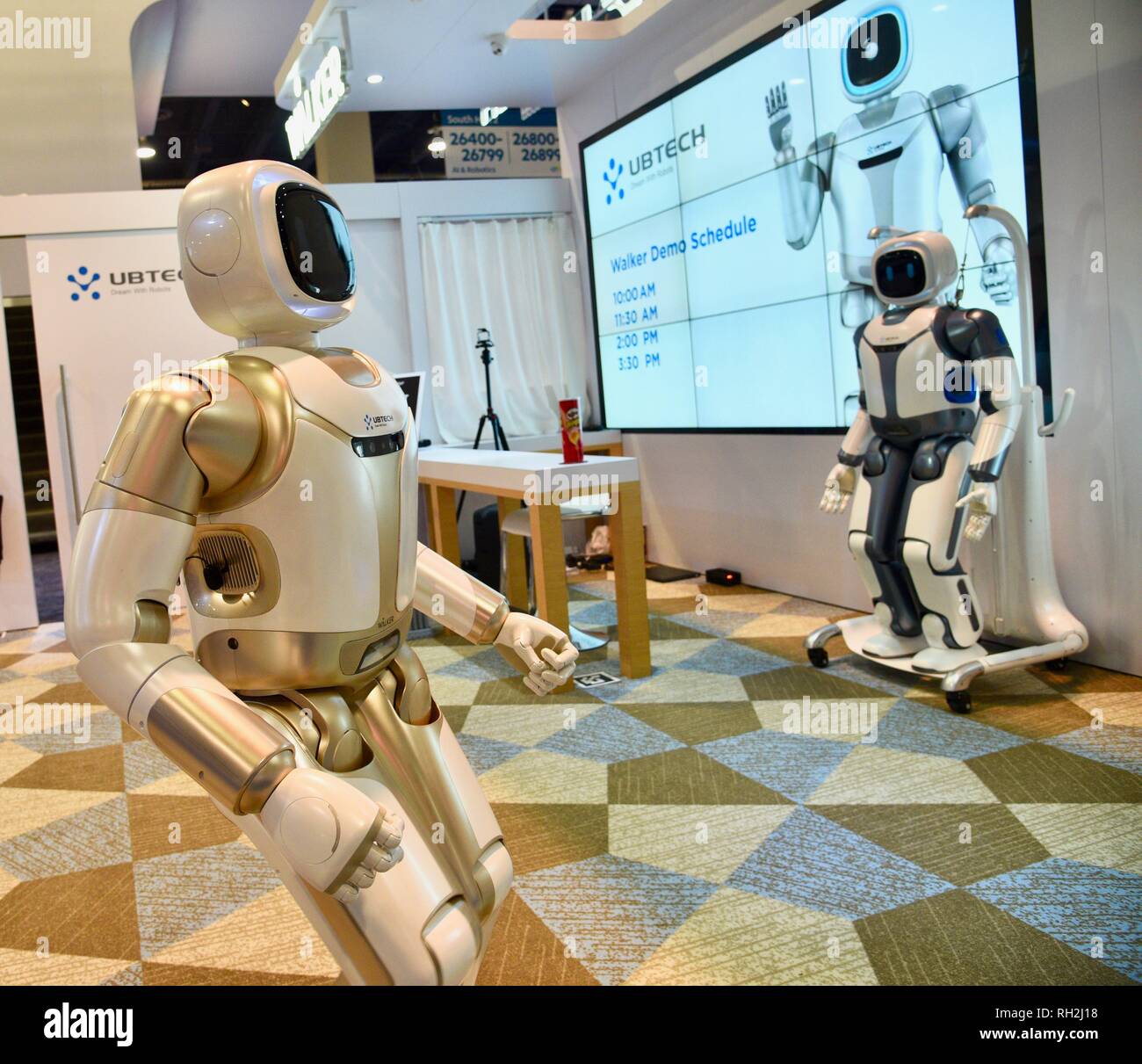 Ubtech's humanoid robot, Walker, demonstrates robotic skills at exhibit ...