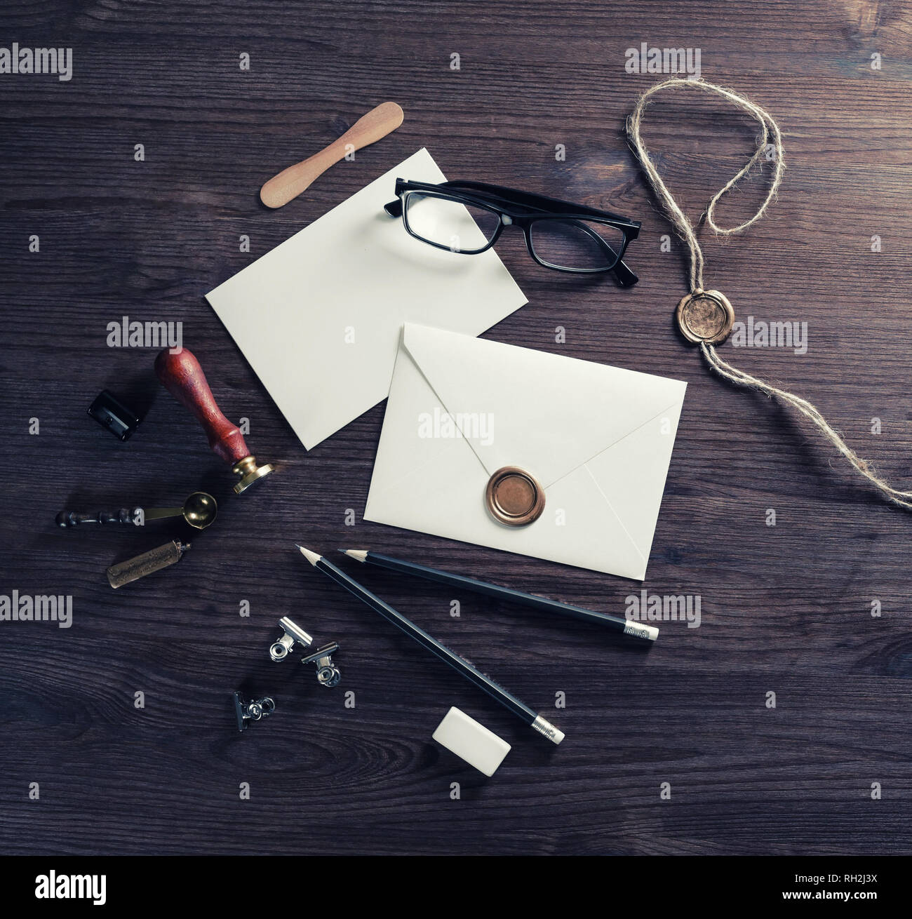 Blank envelopes and retro stationery set on wood table background. Flat ...