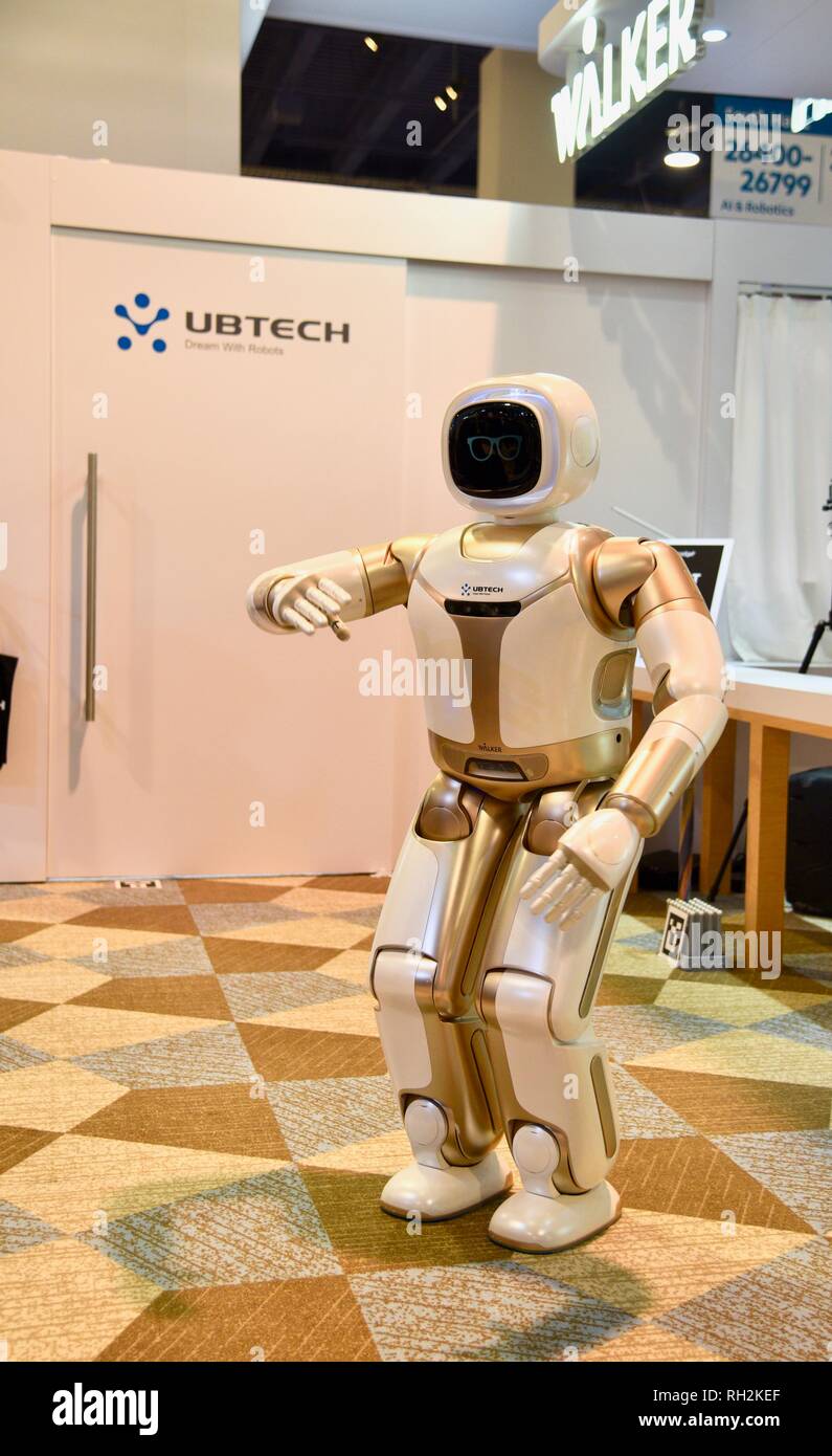 Ubtech's humanoid robot, Walker, demonstrates robotic skills at exhibit ...