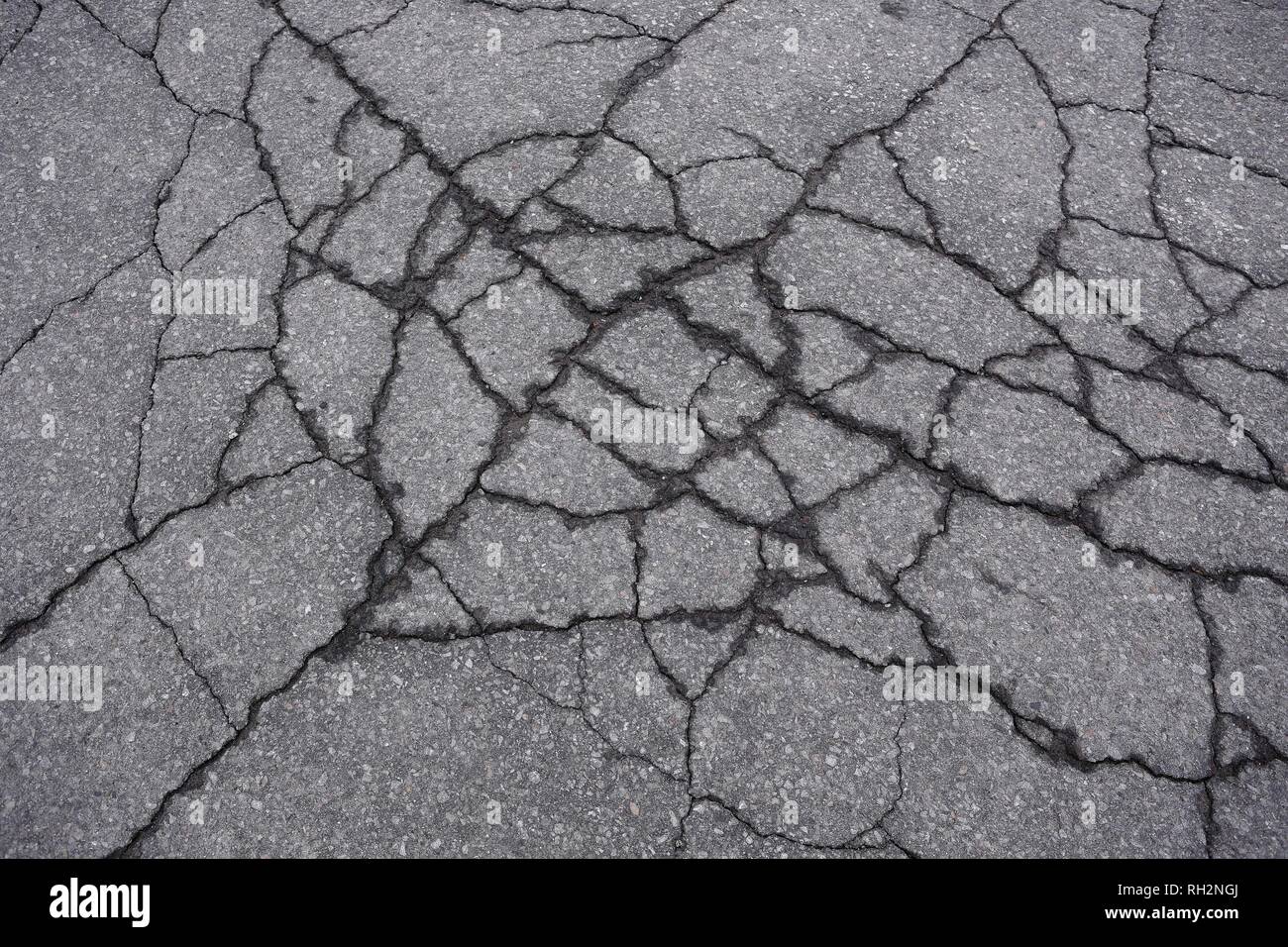 Broken asphalt, street damage, Quebec Province, Canada Stock Photo - Alamy
