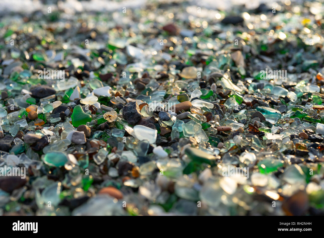 Glass beach is an attraction for travelers and tourists Stock Photo - Alamy