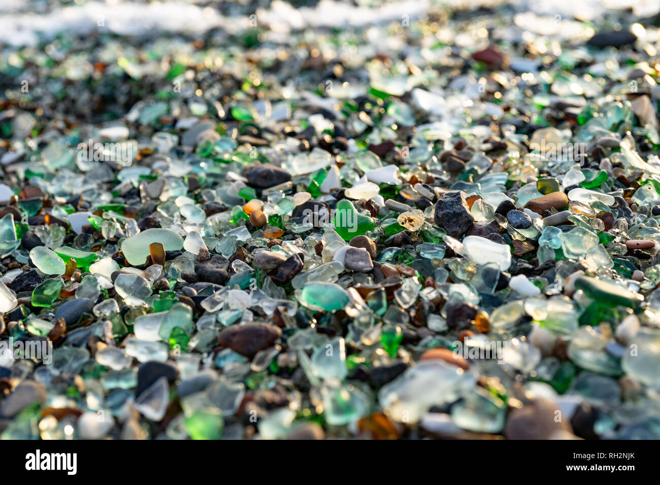Glass beach is an attraction for travelers and tourists Stock Photo - Alamy