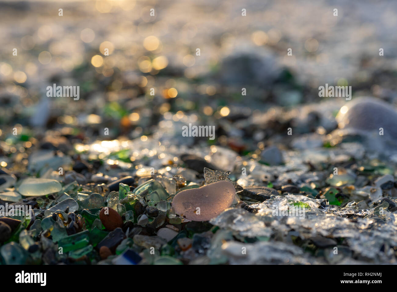 Glass beach is an attraction for travelers and tourists Stock Photo - Alamy