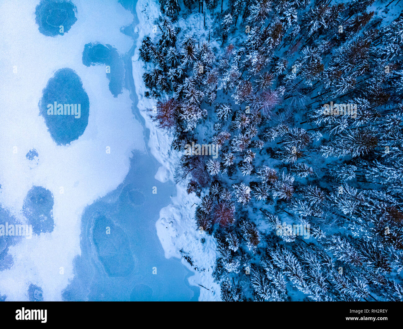 Flying over forest frozen lake hi-res stock photography and images - Alamy