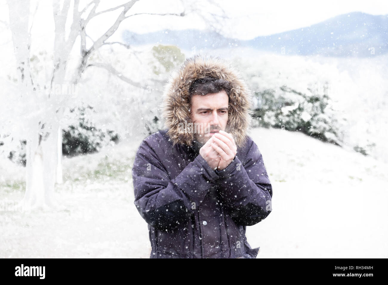 Man shivering snow hi-res stock photography and images - Alamy