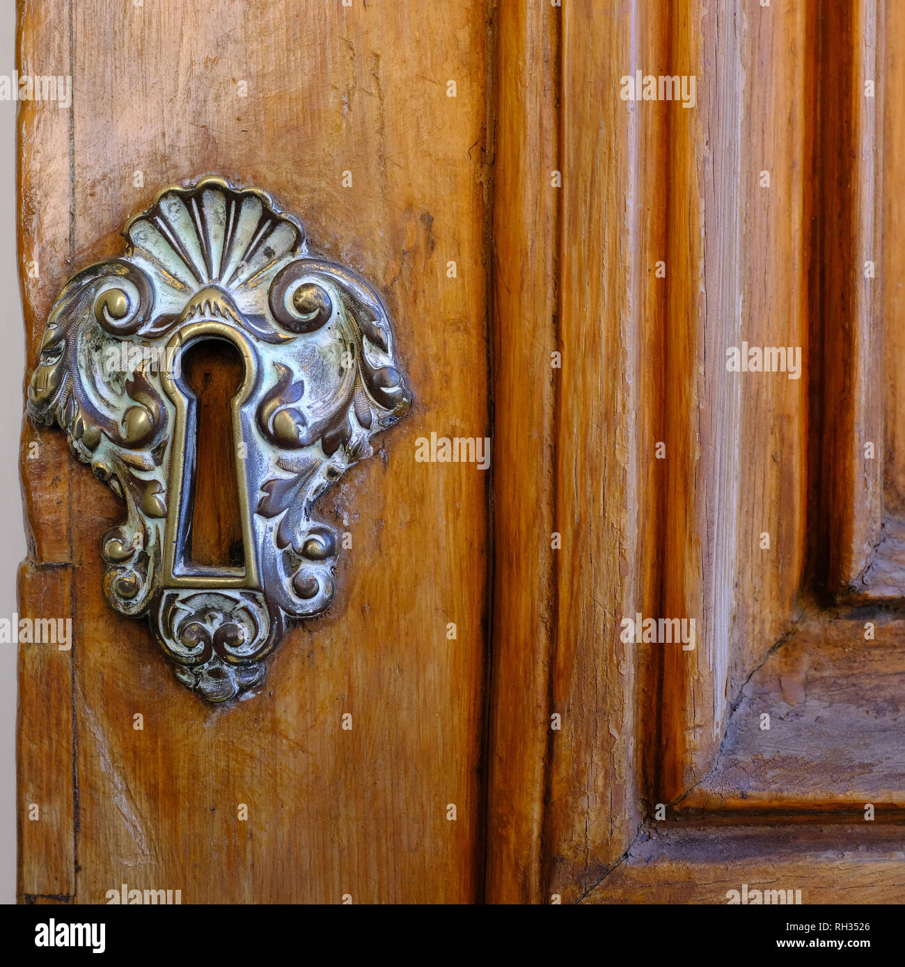 Ornate Vintage decorative keyhole on wooden door Florence Italy Stock ...