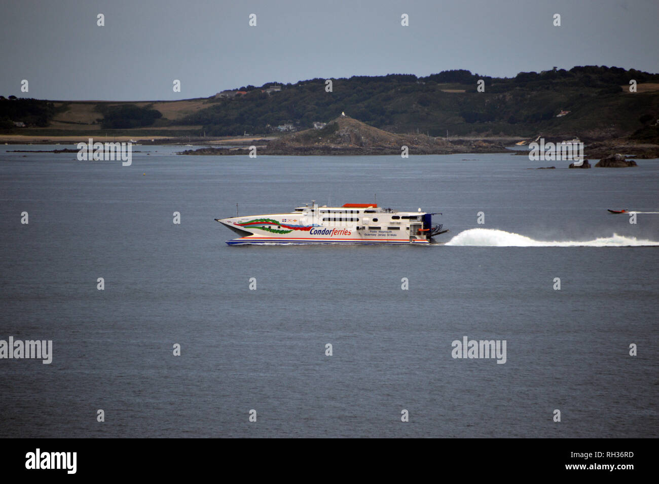 The Condor High-speed Catamaran Car Ferry 'Rapide' Sails Towards St Peter Port Harbour from the ...