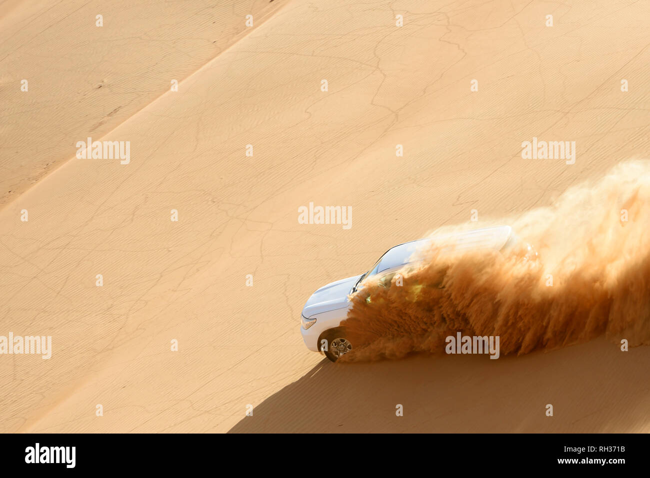Car driving through desert Stock Photo - Alamy
