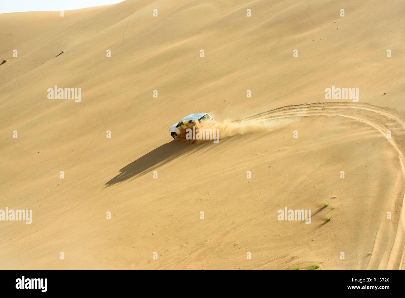 Car driving through desert Stock Photo - Alamy