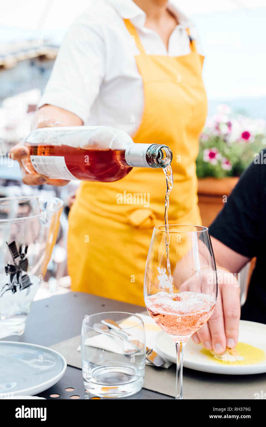 Waitress serving food restaurant hi-res stock photography and images ...