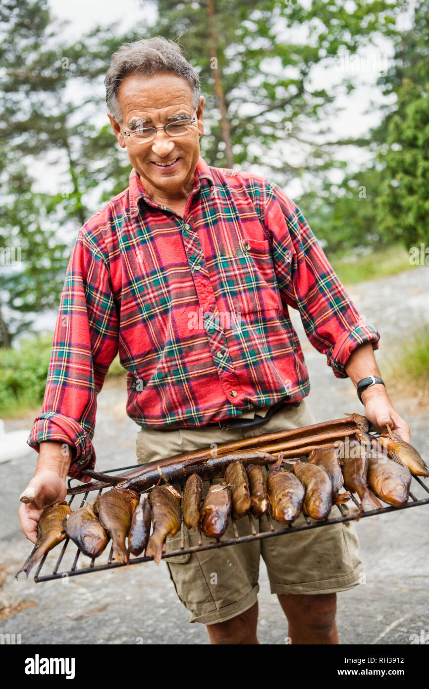 Man fish hi-res stock photography and images - Alamy