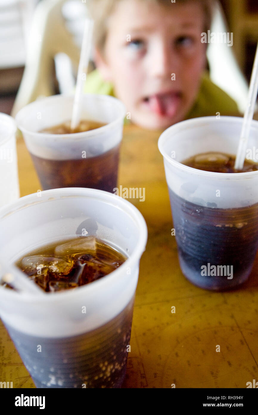 Drinks with ice cubes in disposable cups Stock Photo - Alamy