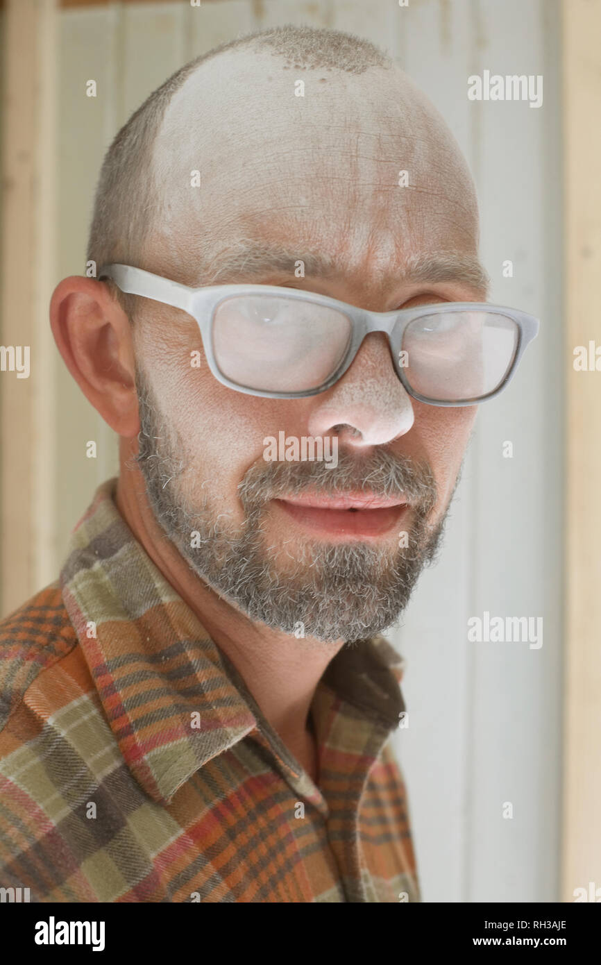 Portrait of man with face covered by powder Stock Photo - Alamy