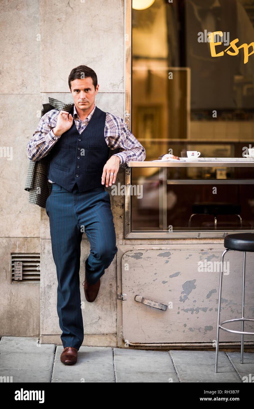 Man in front of cafe hi-res stock photography and images - Alamy