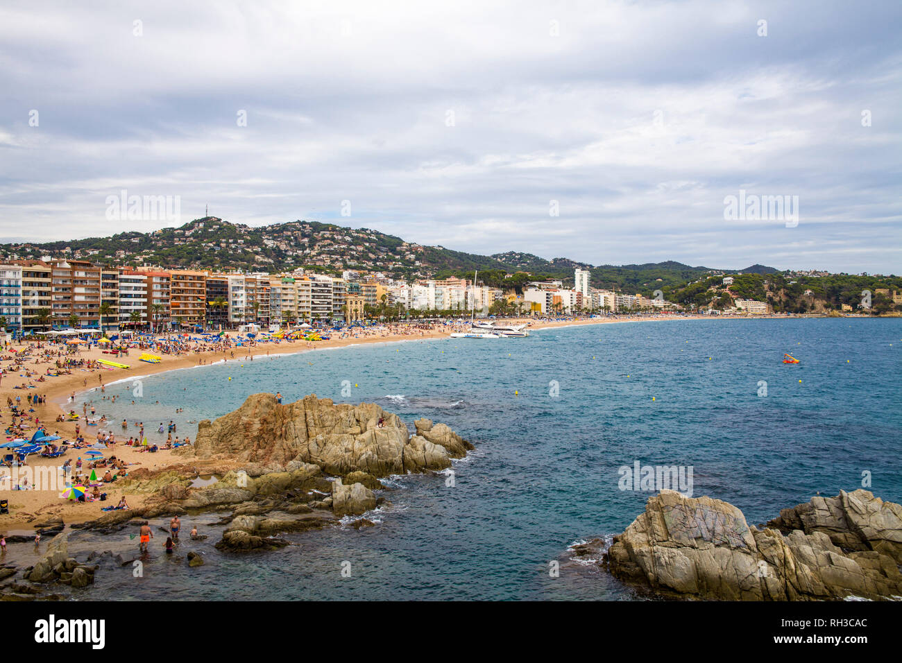 Beach in the city of Lloret de Mar on the Costa Brava. A beautiful ...