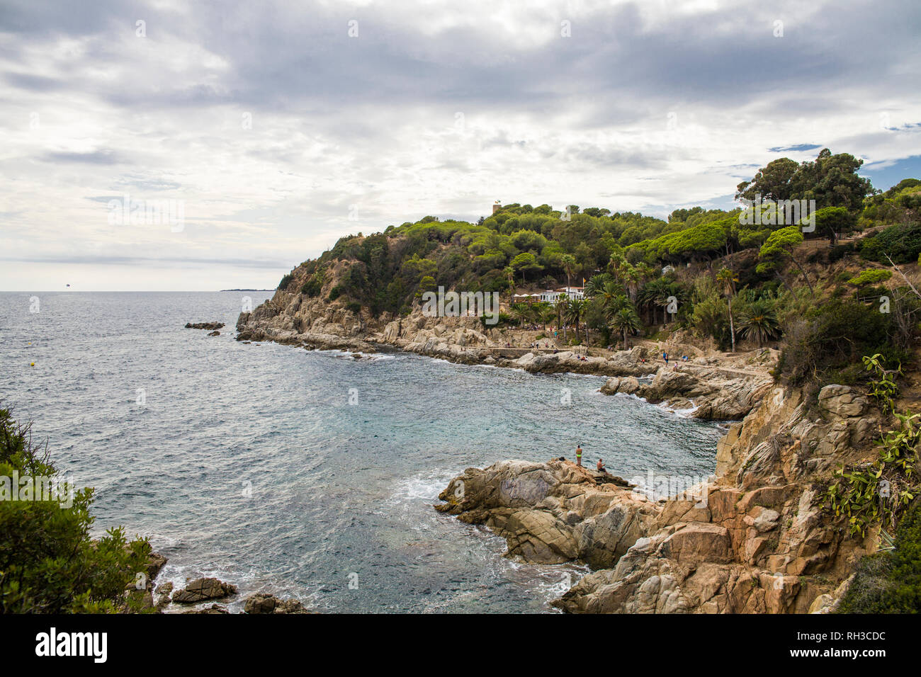 Beach in the city of Lloret de Mar on the Costa Brava. A beautiful ...