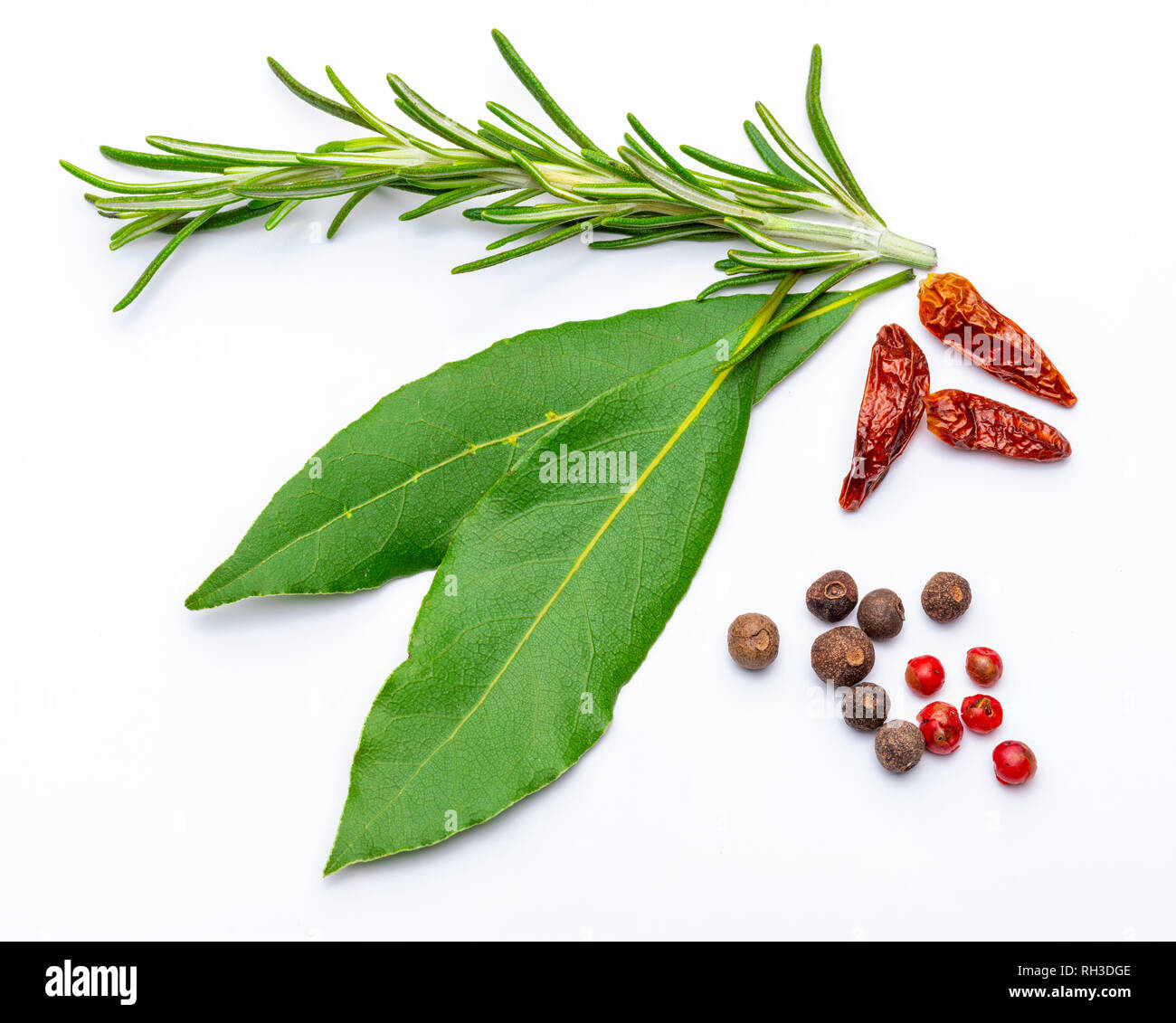 Traditional spices, rosemary branch, bay leaves, chilli pepper (cayenne ...