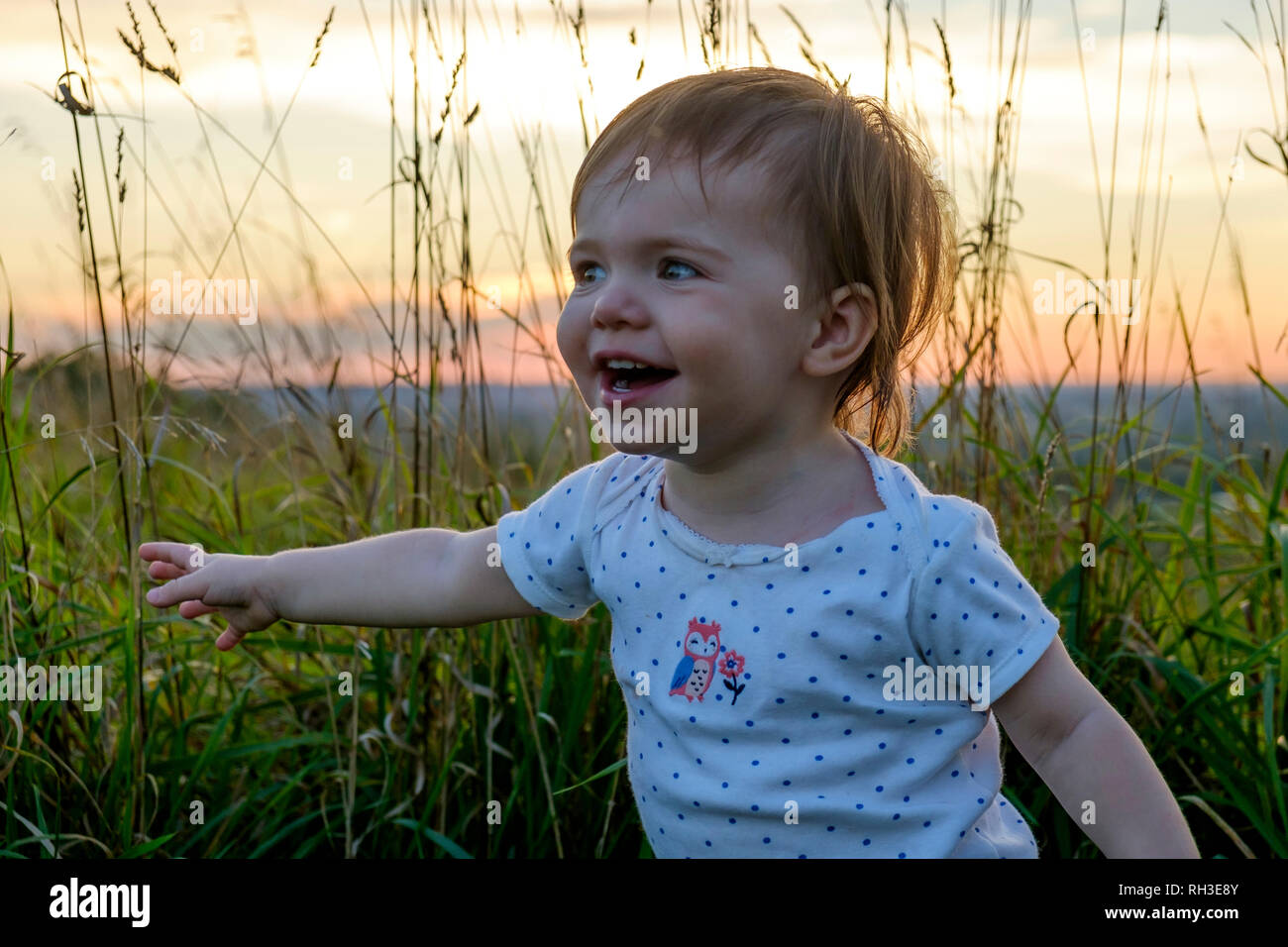 Toddler having fun Stock Photo - Alamy