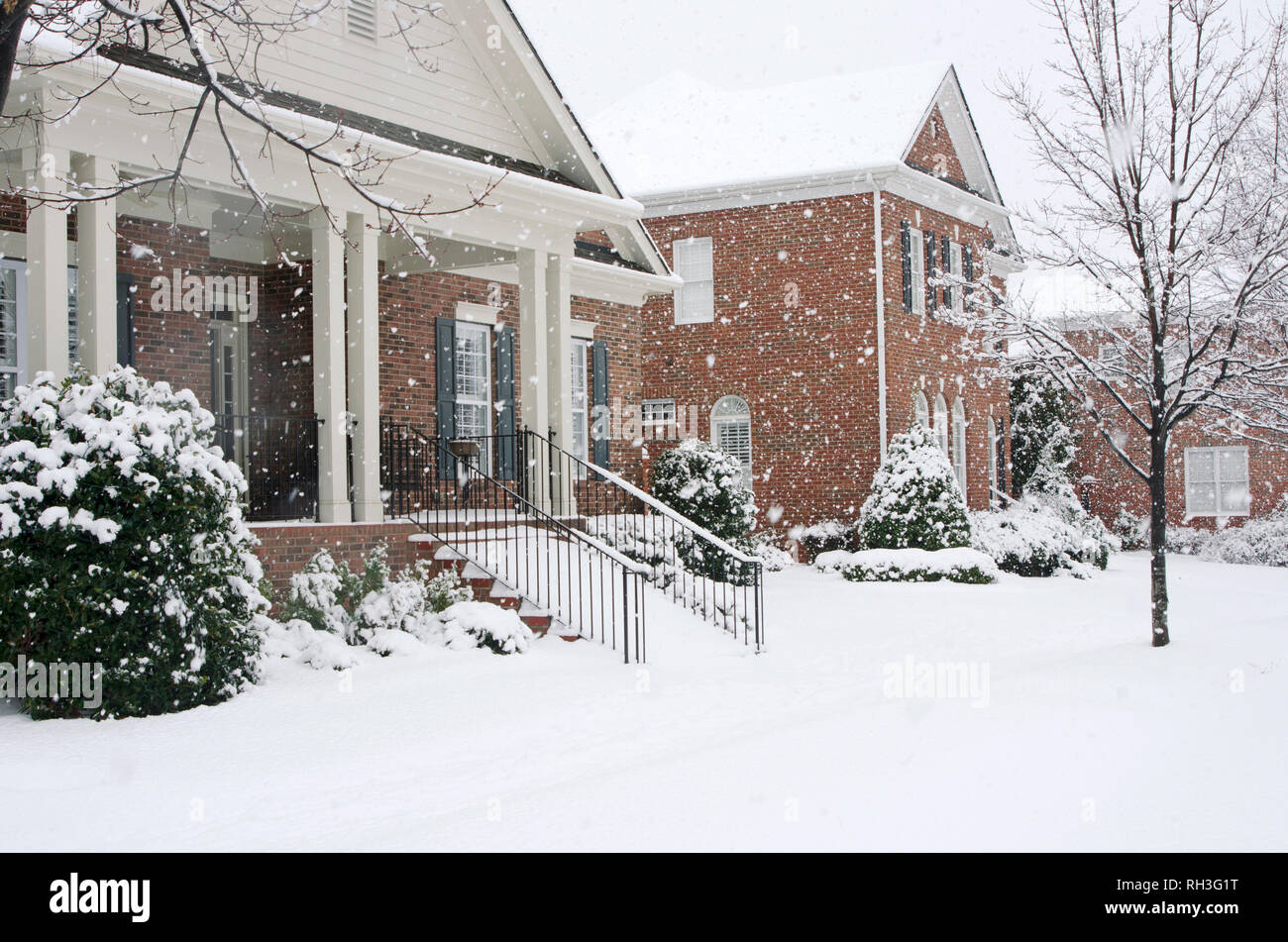 Traditional Brick Homes in a Neighborhood Covered in Snow After a Storm ...