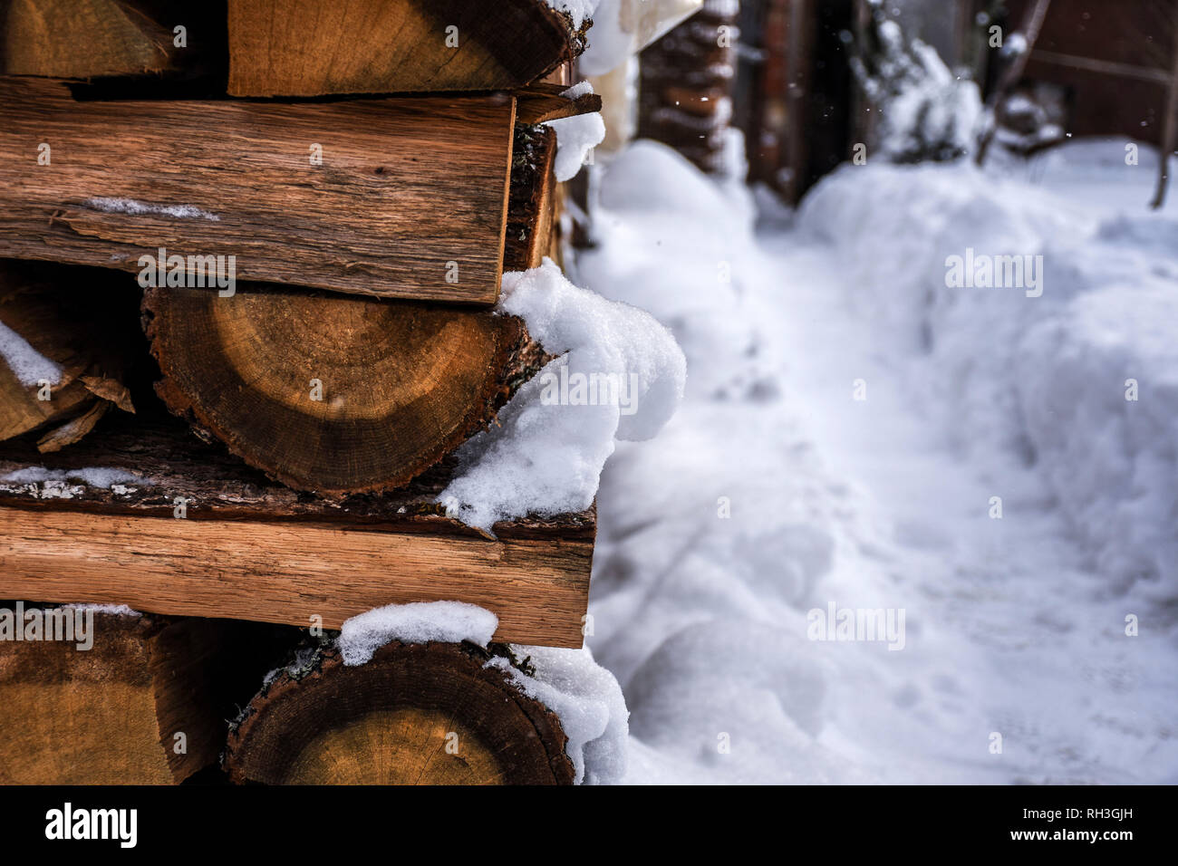 Wood in the snow hi-res stock photography and images - Alamy
