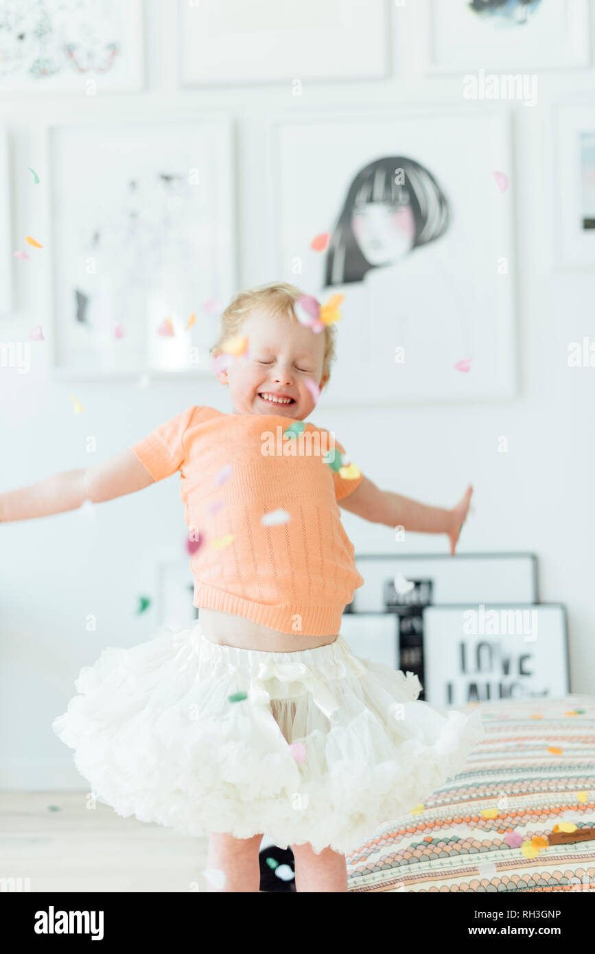 Happy girl dancing Stock Photo - Alamy