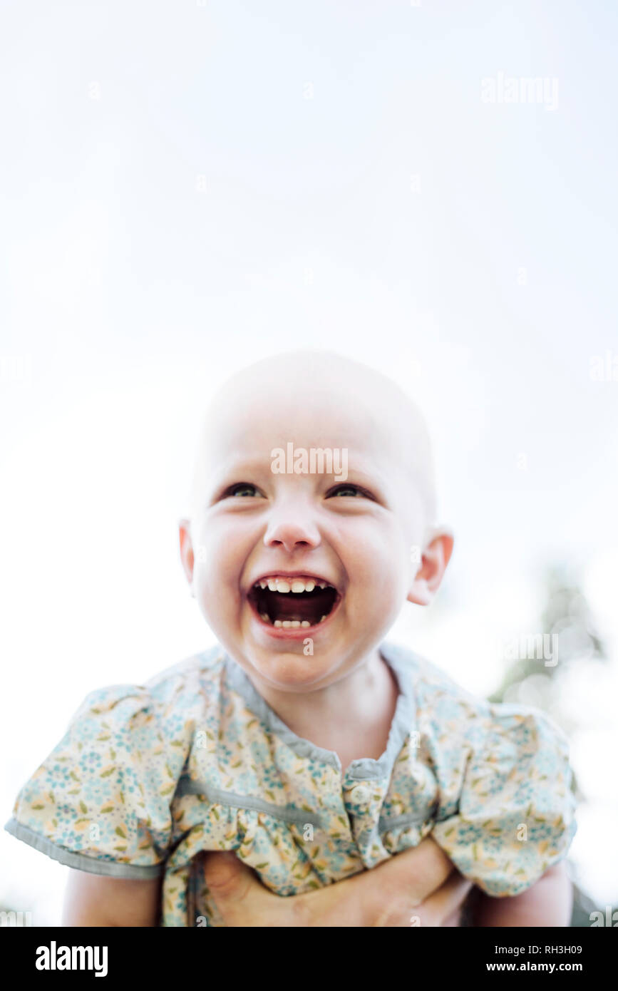 Laughing baby girl Stock Photo - Alamy