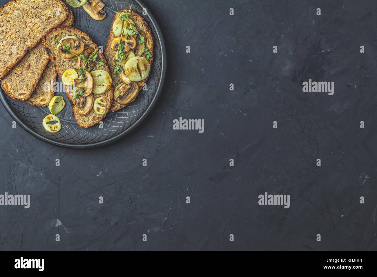 Delicious homemade whole grain rye sliced bread toast with fried ...