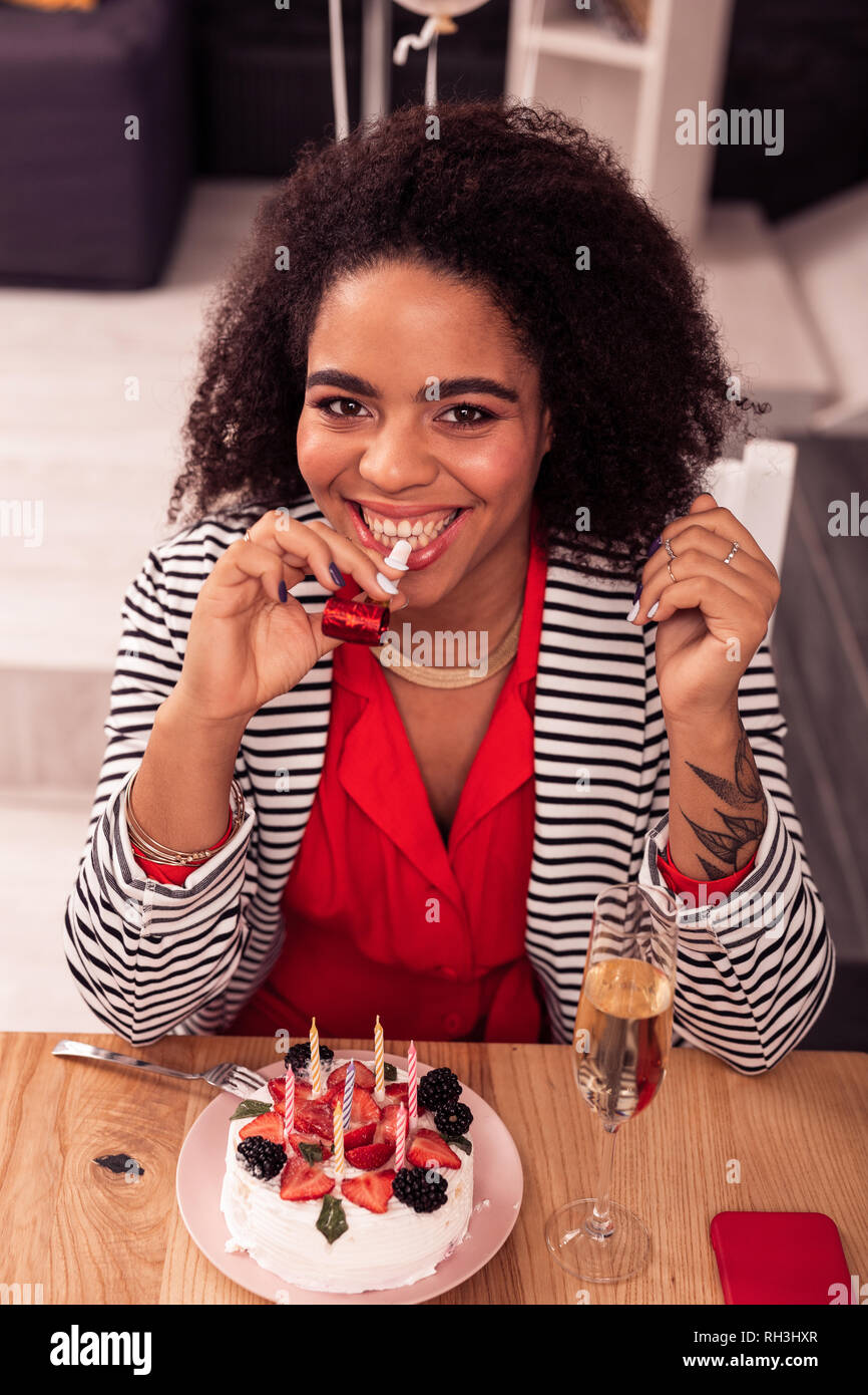 Cheerful positive woman having a fun party Stock Photo - Alamy