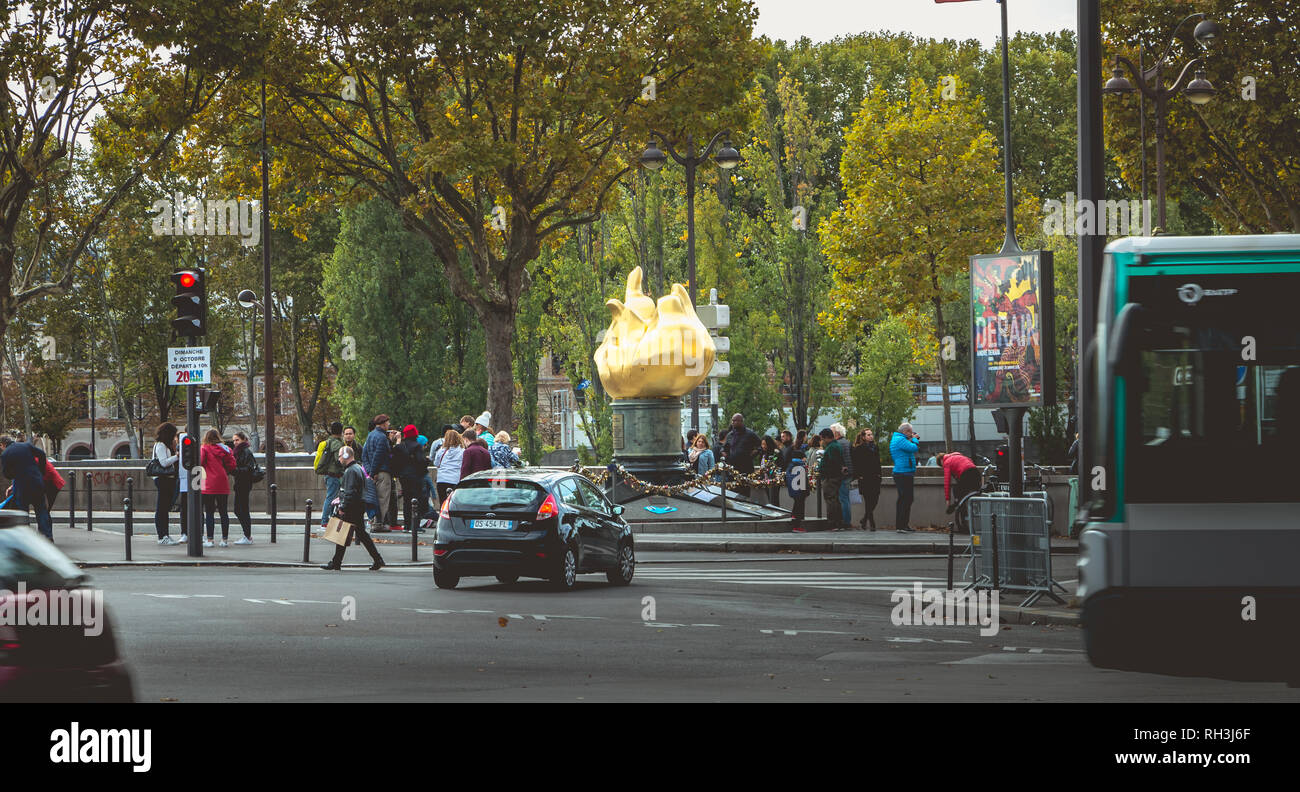 Paris, France - October 7, 2017: People watching the replica of the ...