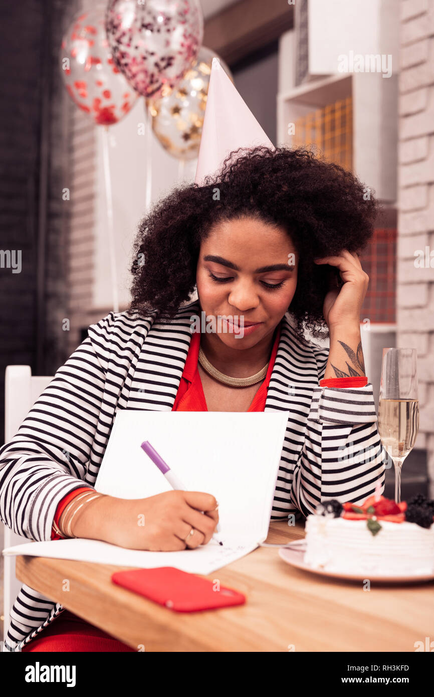 Writing a list woman hi-res stock photography and images - Alamy