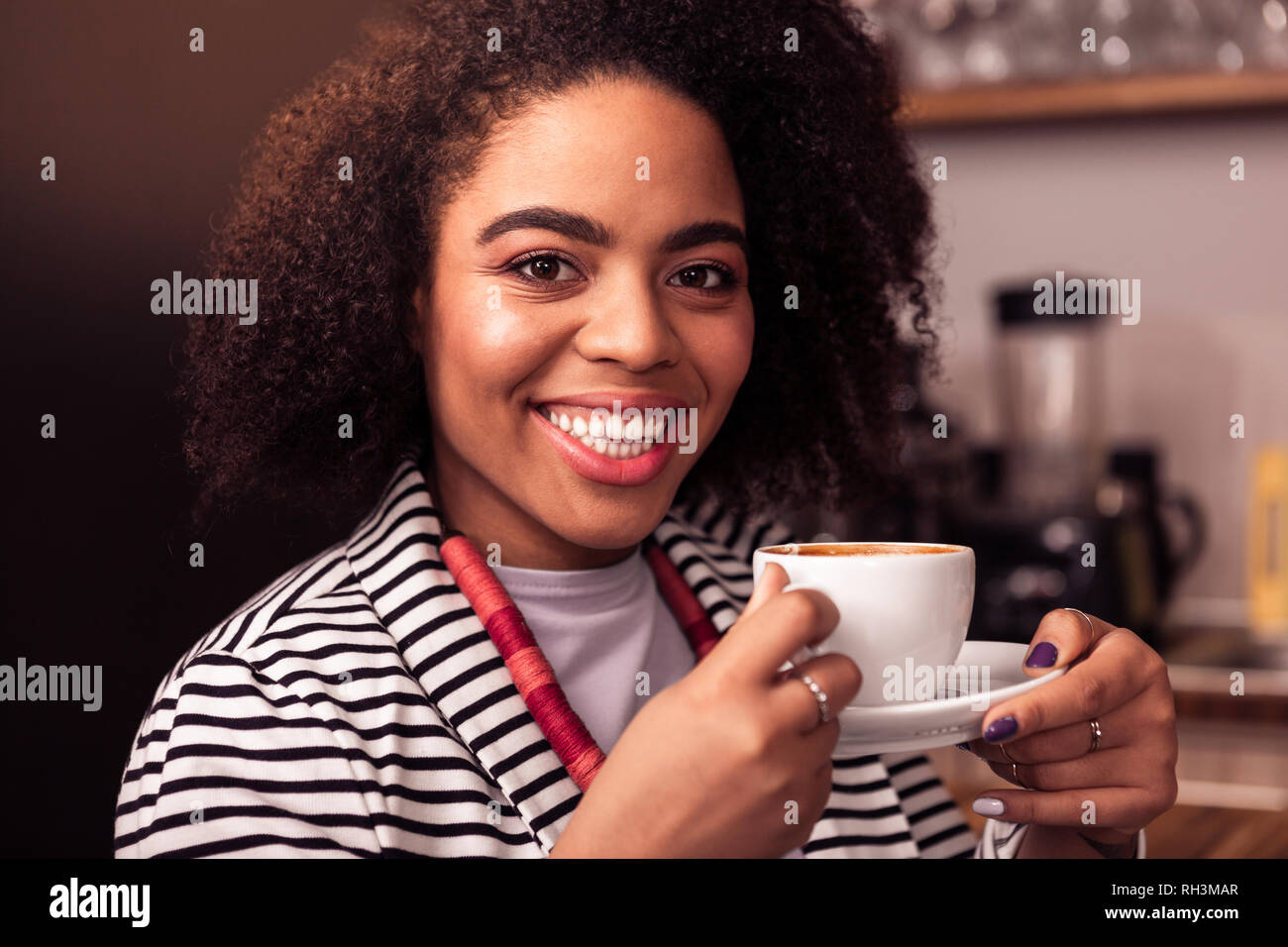 Portrait of a cheerful nice woman with coffee Stock Photo - Alamy