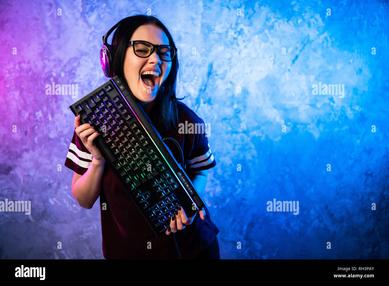 Beautiful Friendly Pro Gamer Streamer Girl Posing With a Keyboard in ...