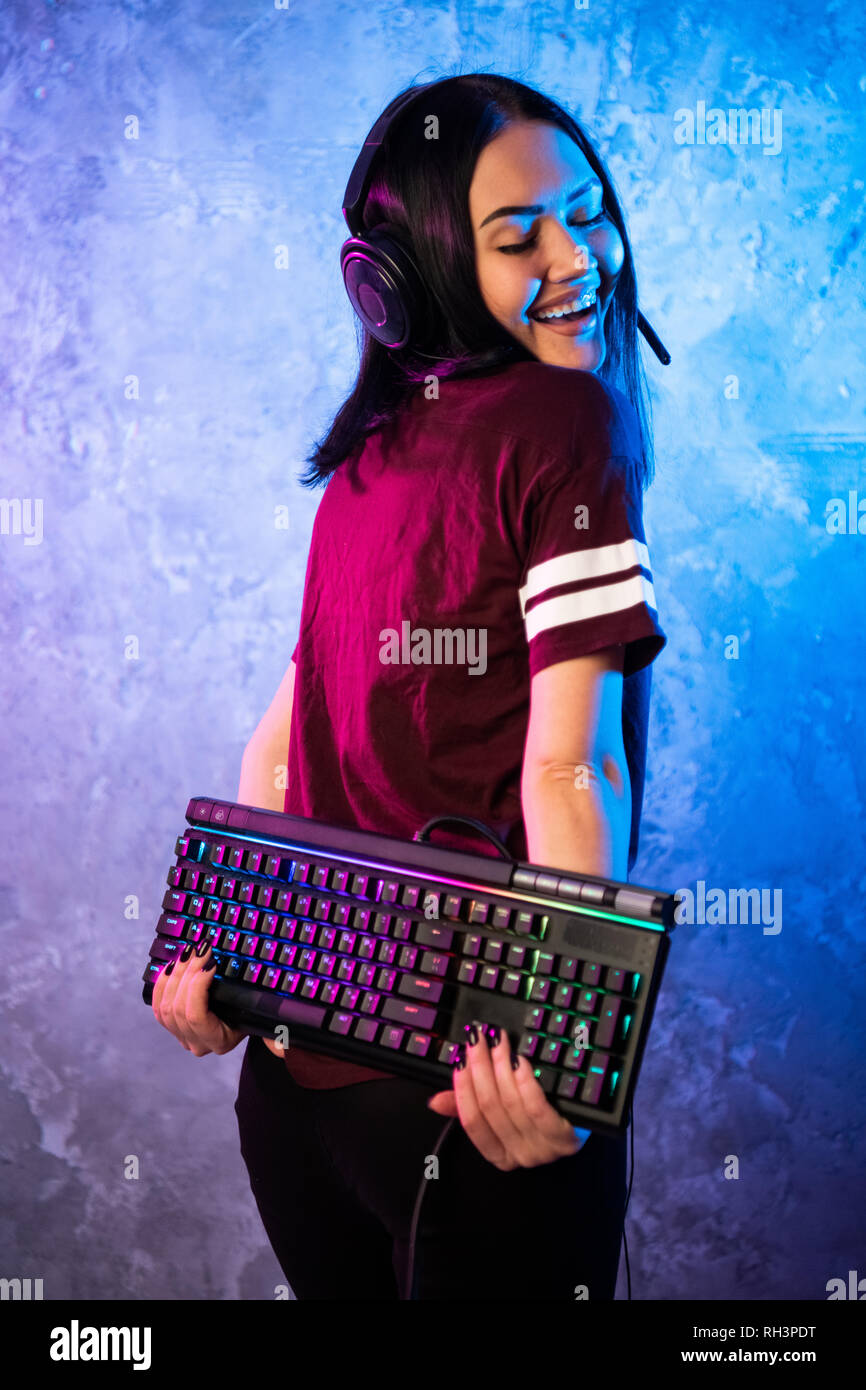 Beautiful Friendly Pro Gamer Streamer Girl Posing With a Keyboard in ...