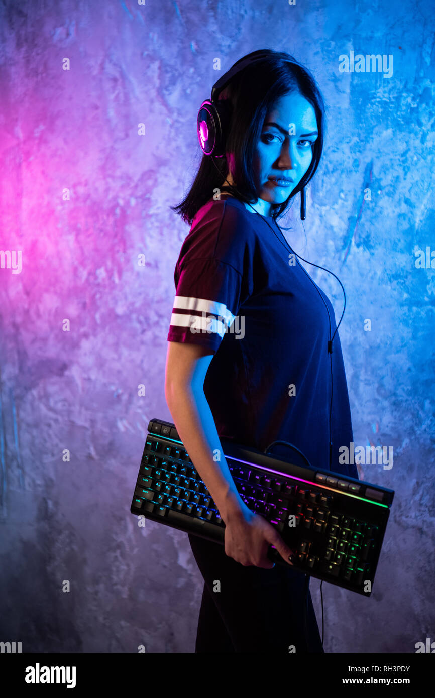 Beautiful Friendly Pro Gamer Streamer Girl Posing With a Keyboard in ...