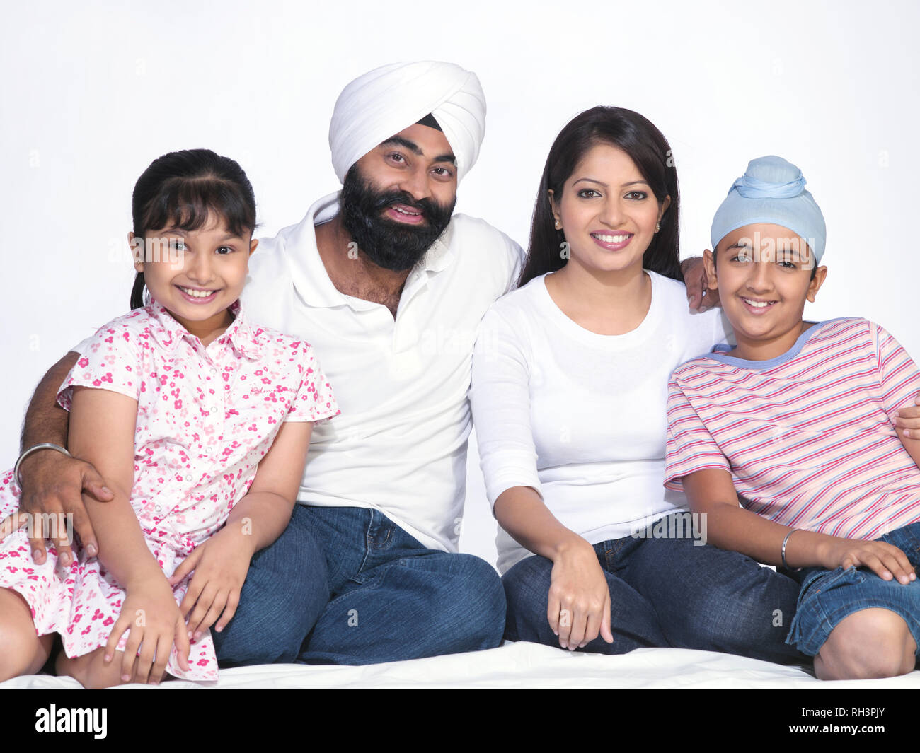 PORTRAIT OF A SIKH SARDAR FAMILY OF FOUR Stock Photo - Alamy