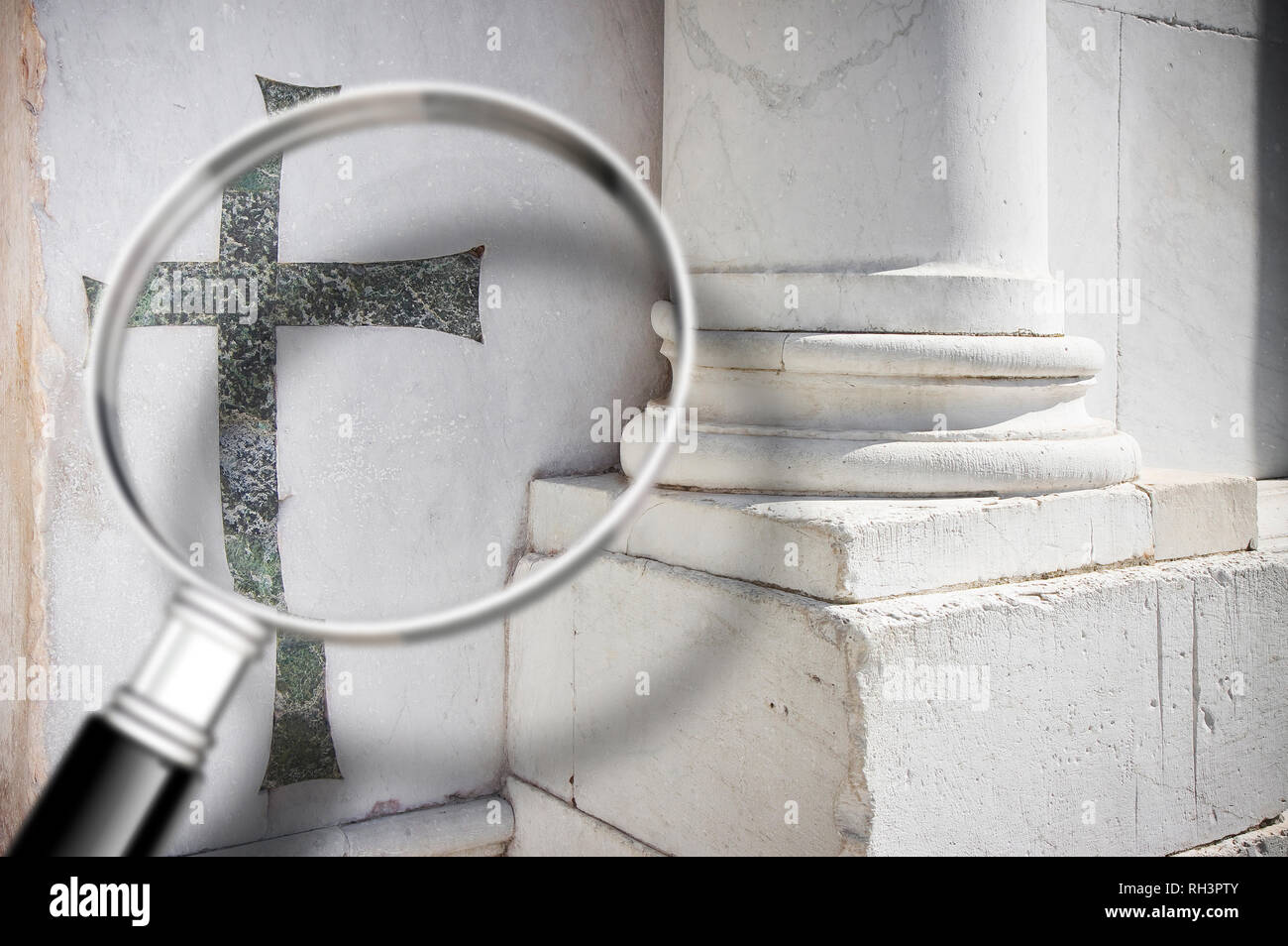 Looking for faith - concept image with a magnifying glass in front of a ...