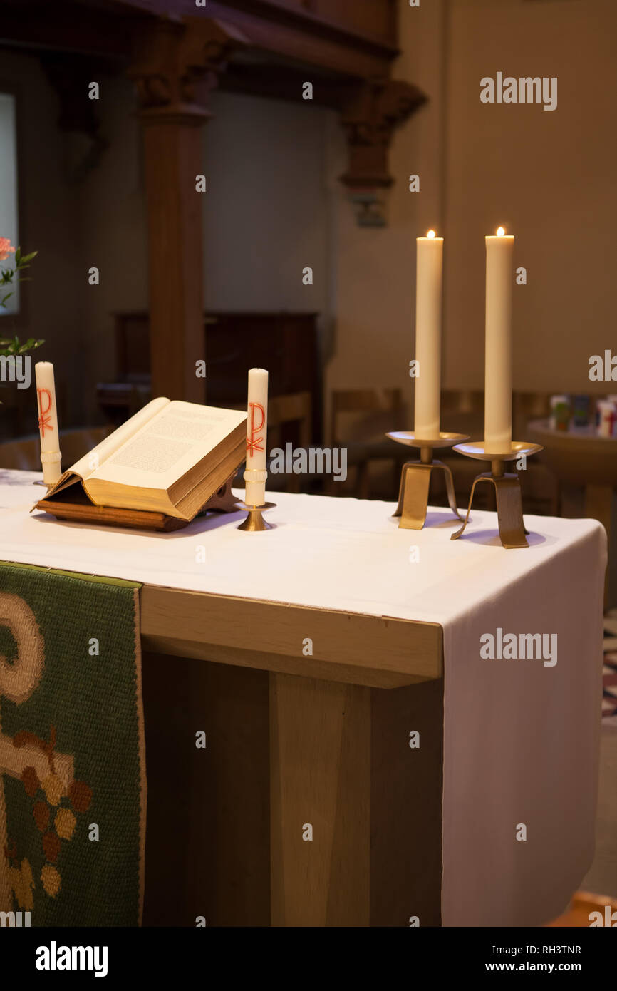 Bible on altar hi-res stock photography and images - Alamy