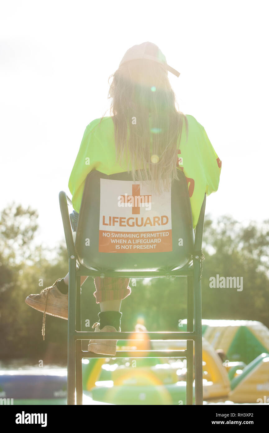 Female lifeguard at water park hi-res stock photography and images - Alamy