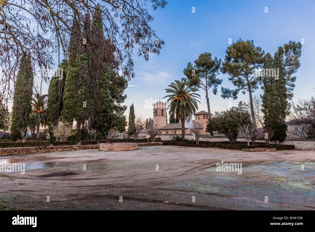 View of one of the courtyards or gardens of the Alhambra with its trees ...