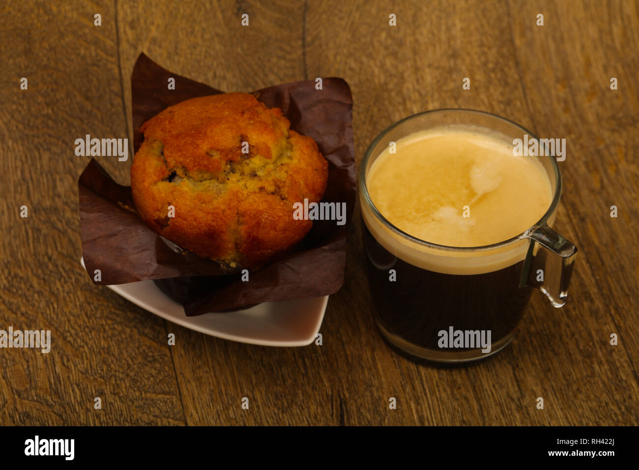 Muffin with espresso coffee Stock Photo - Alamy