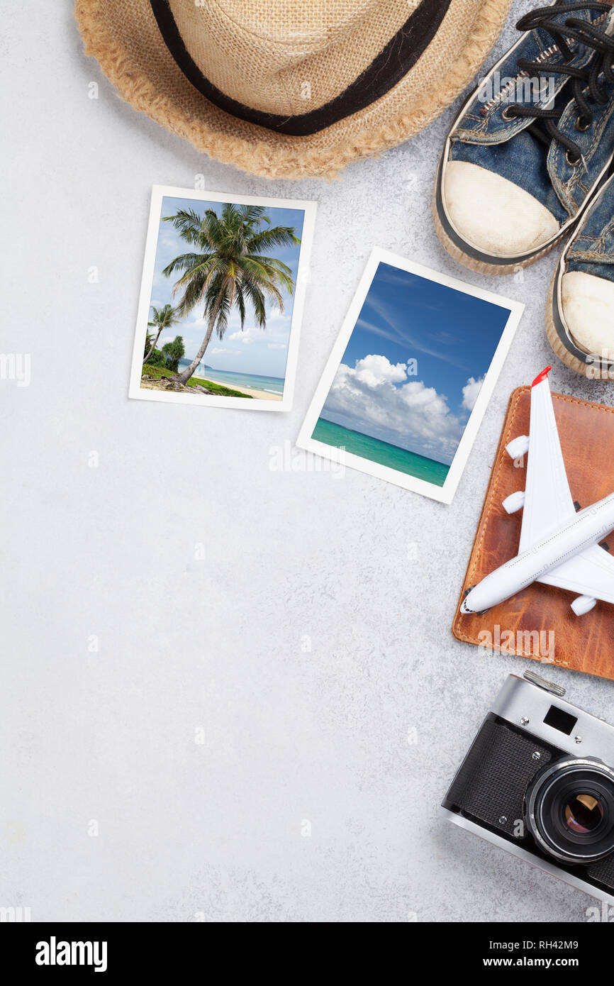Travel vacation background concept with sun hat, camera, passport ...