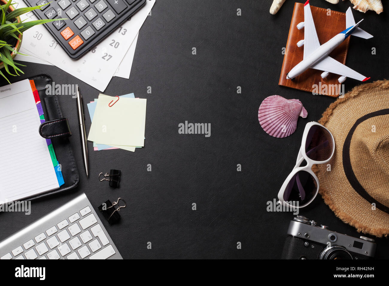 Business travel trip concept. Accessories on desk table. Pc keyboard ...