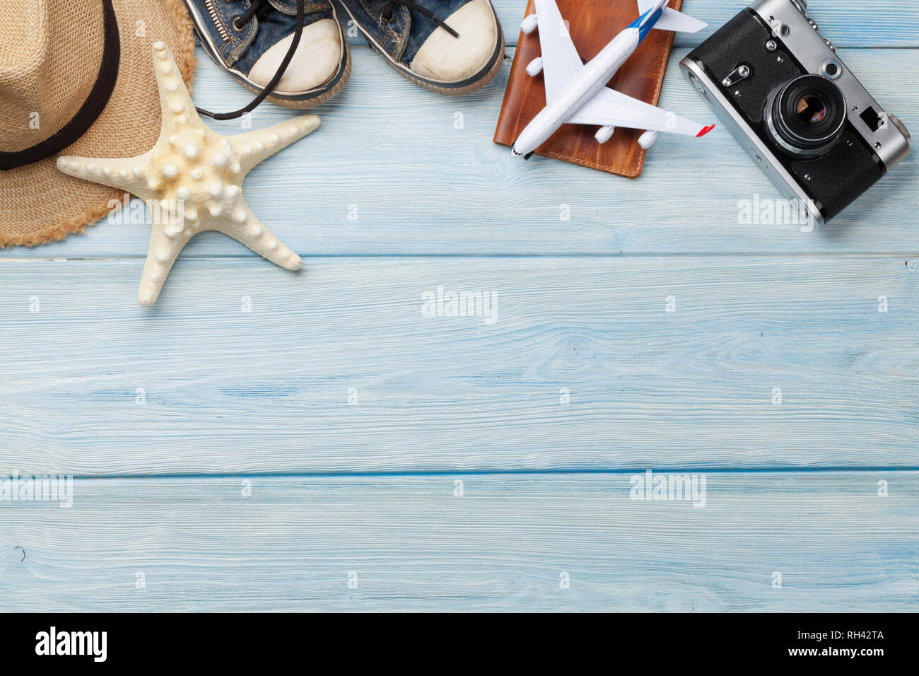 Travel vacation background concept with sun hat, camera, passport ...