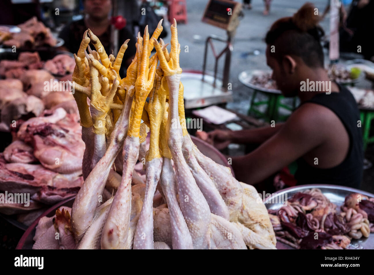 Yangon, Myanmar - 29 September 2016: Chicken on sale on a street market ...