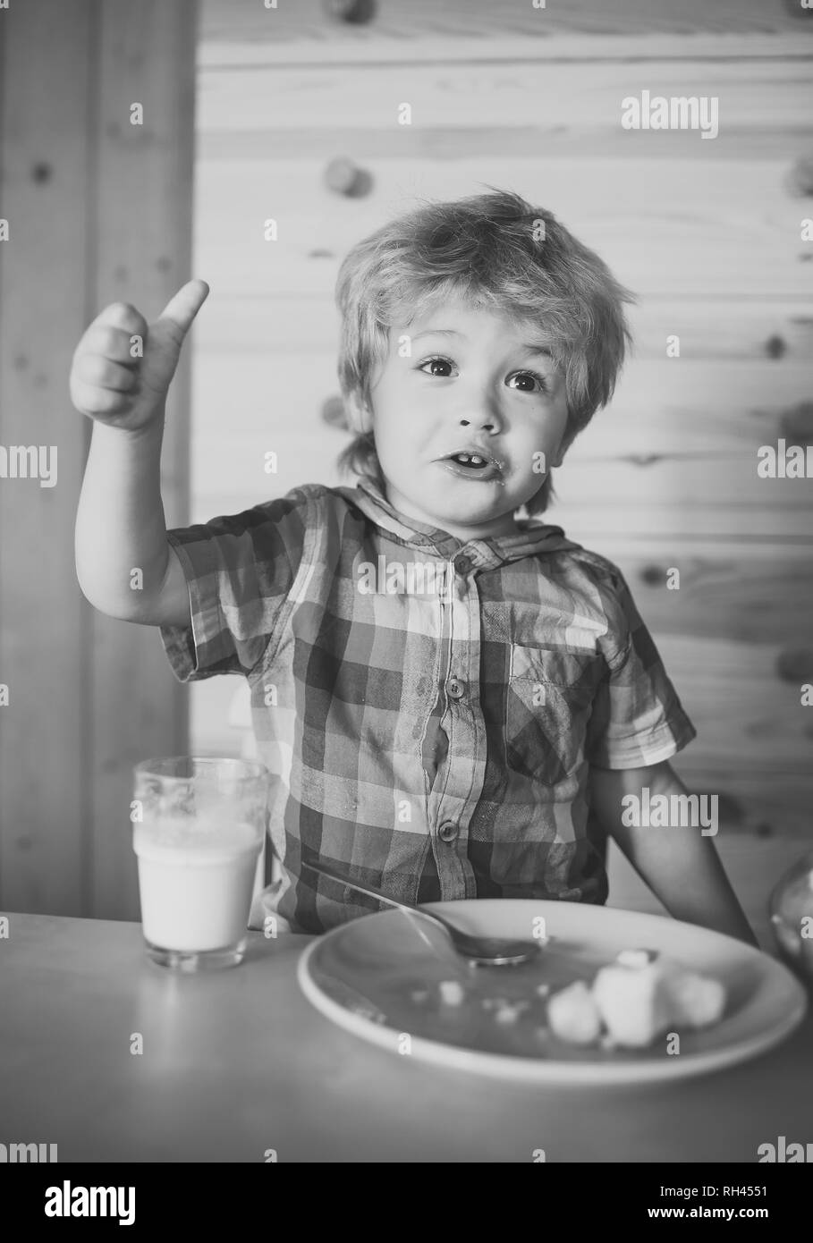 Sitting childhood eating smiling food and drink Black and White Stock ...