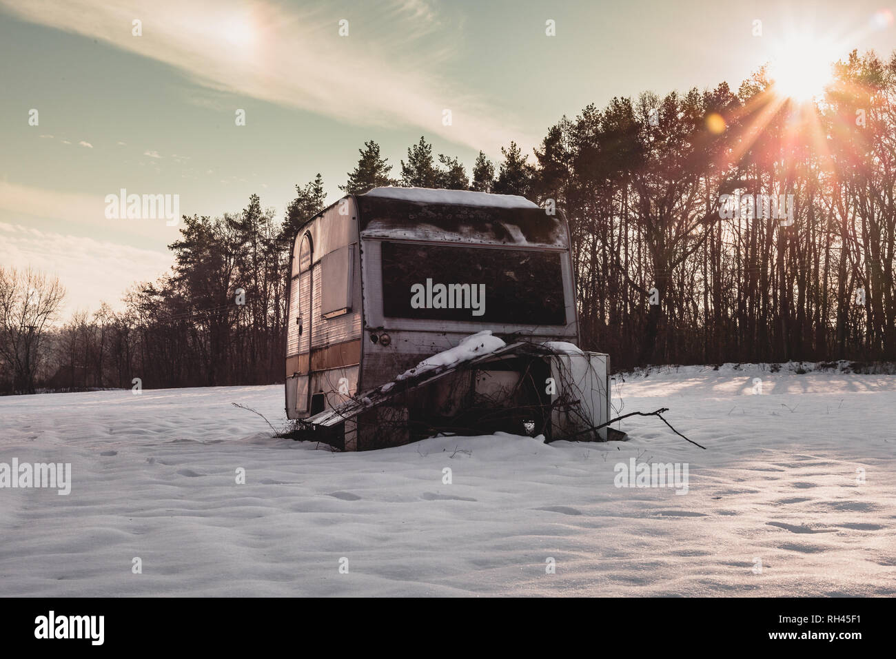 Beautiful photo of old and abandoned caravan in the middle of snow ...